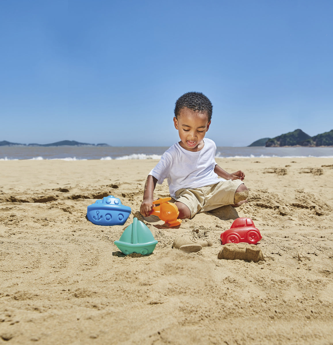 Hape Beach Toy Travel Sand Mold Set – Growing Tree Toys